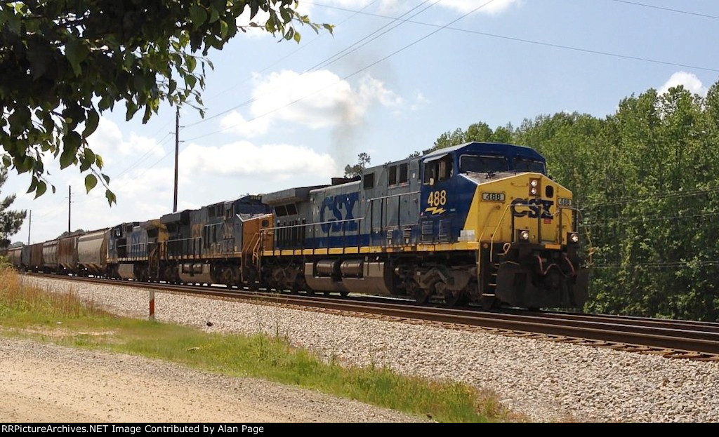 CSX 488, 3148, and 7663 roll NB